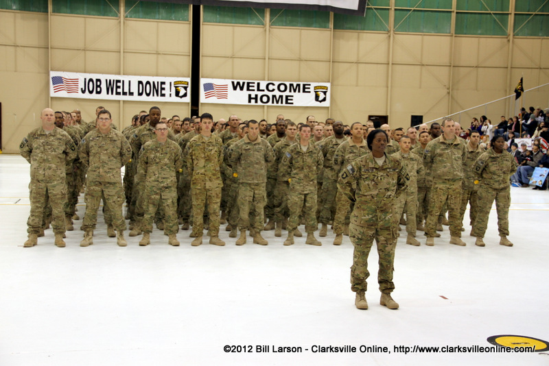 The 154 returning soldiers of the 159th Combat Aviation Brigade stand ...