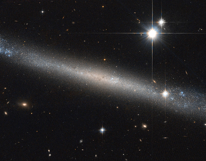 NASA's Hubble Space Telescope captures image of super thin galaxy ... NASA's Hubble Space Telescope captures image of super thin galaxy ...