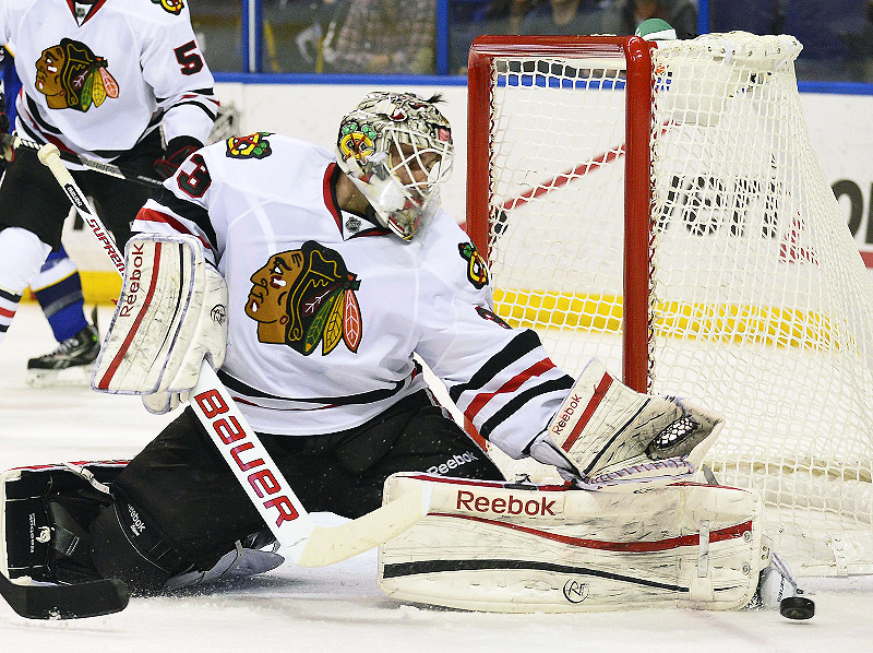 Carter Hutton (33) makes save during the second period against the St ...