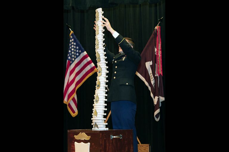 BACH Command Sgt. Major Daniel Santiago places a Sergeant Audie Murphy ...